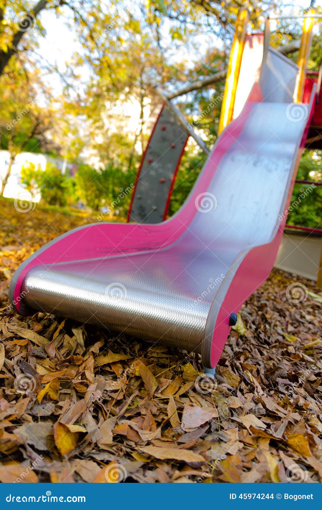 Playground Slides in the Park Stock Photo - Image of trees, fall: 45974244