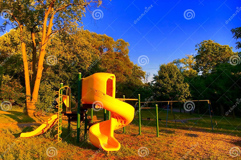 Playground at Sunset stock photo. Image of woodchips - 75163156