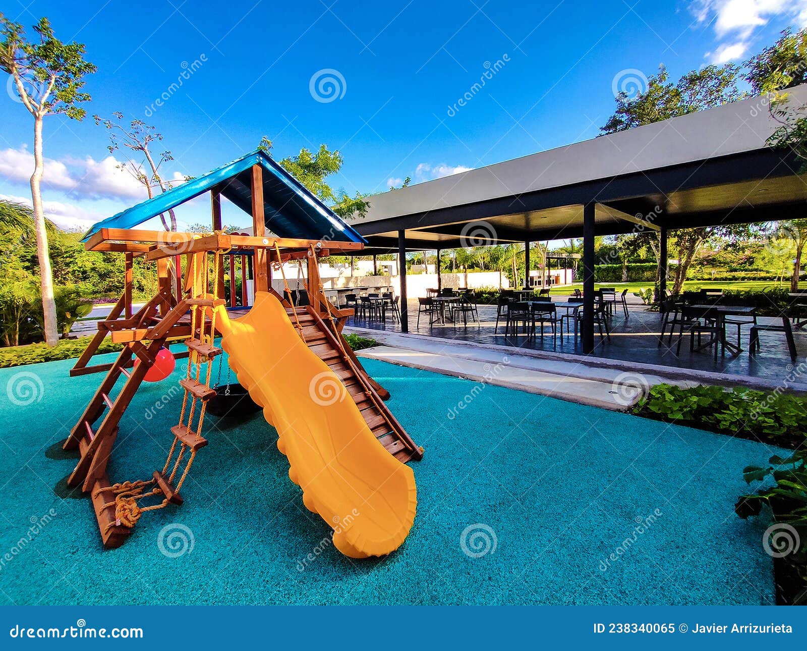 Playground and Terrace with Games Table Inside a Private Residential ...
