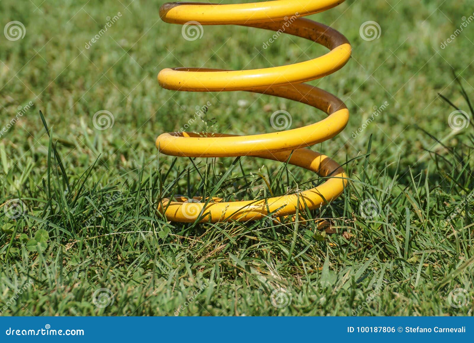 Playground Toy Spring Detail on the Grass Stock Photo - Image of ...