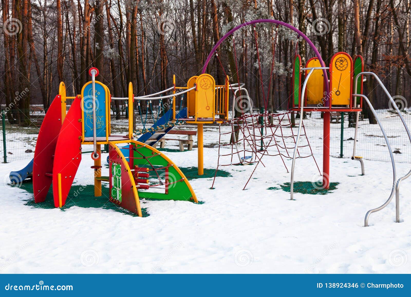 A playground in winter. stock photo. Image of frozen - 138924346