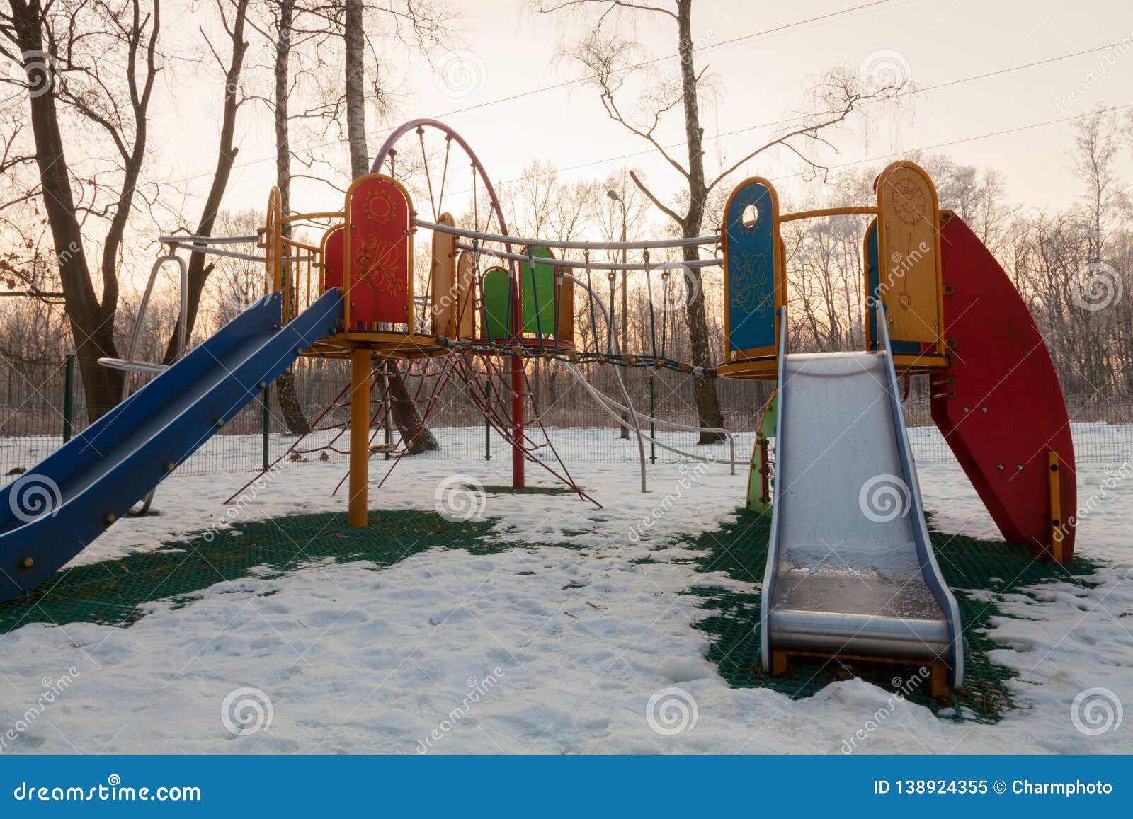 A Playground in Winter during Sunset Stock Image - Image of background ...