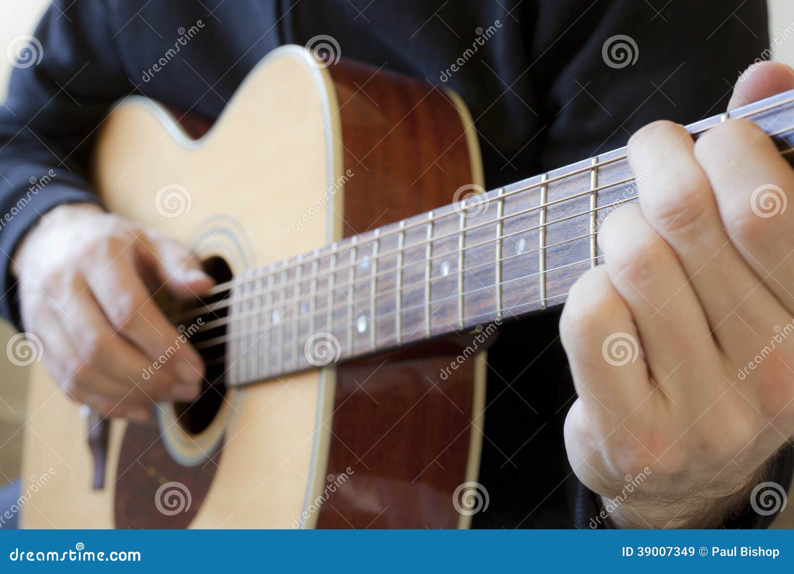 Playing an acoustic guitar stock image. Image of person - 39007349