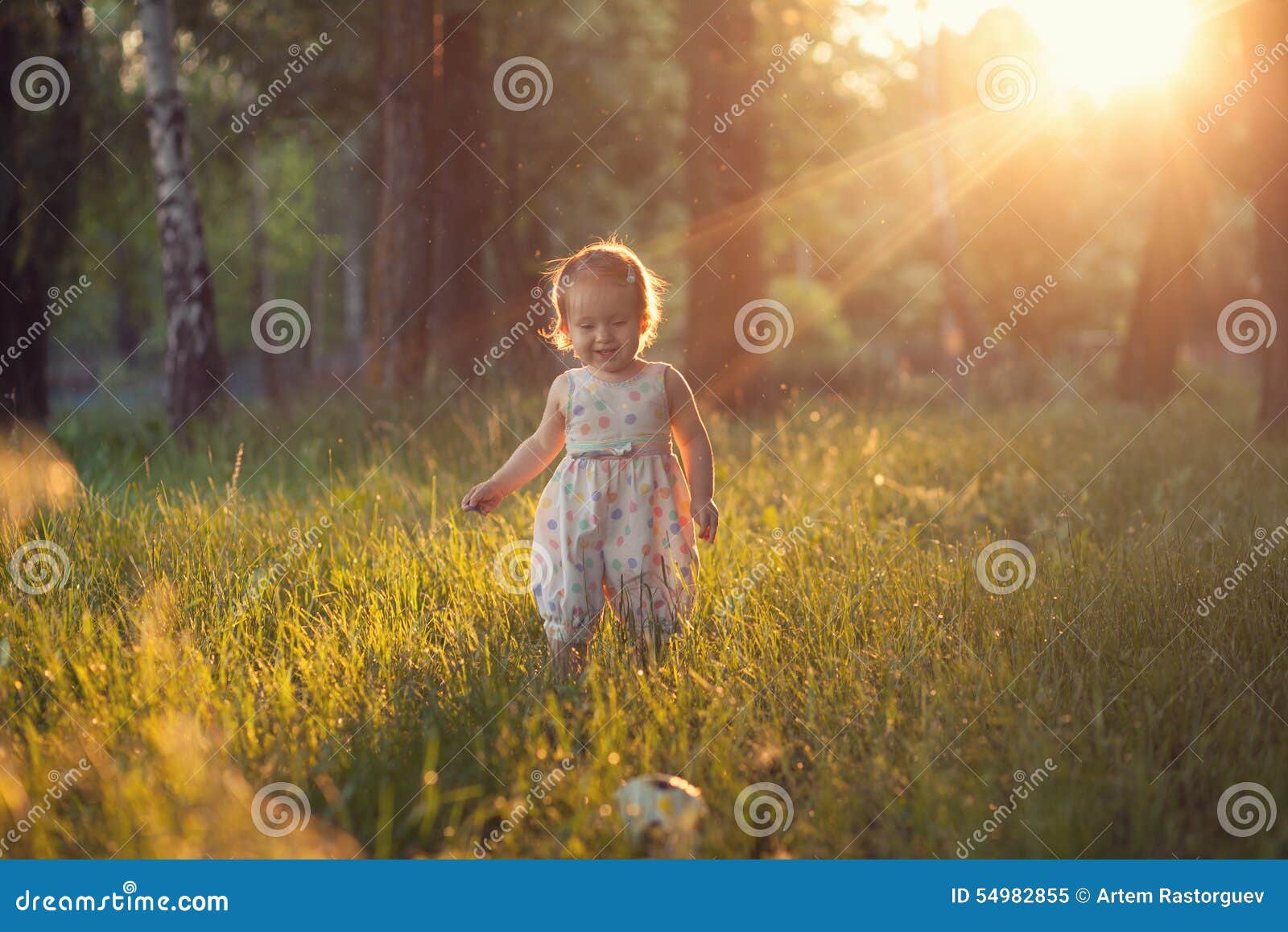 Playing Baby in Sunset Lights Stock Image - Image of childhood ...
