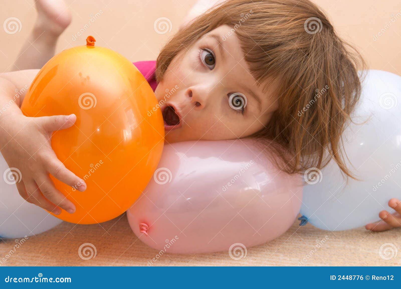 Playing with balloons stock photo. Image of childhood - 2448776