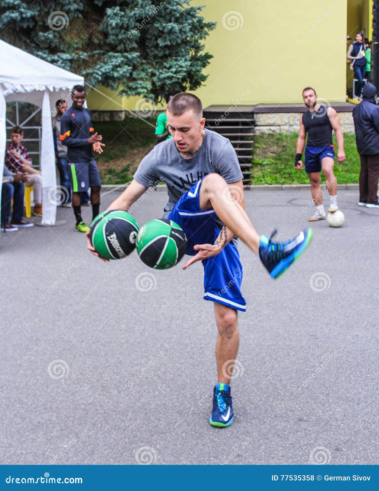 Playing with balls. editorial stock photo. Image of exercise - 77535358
