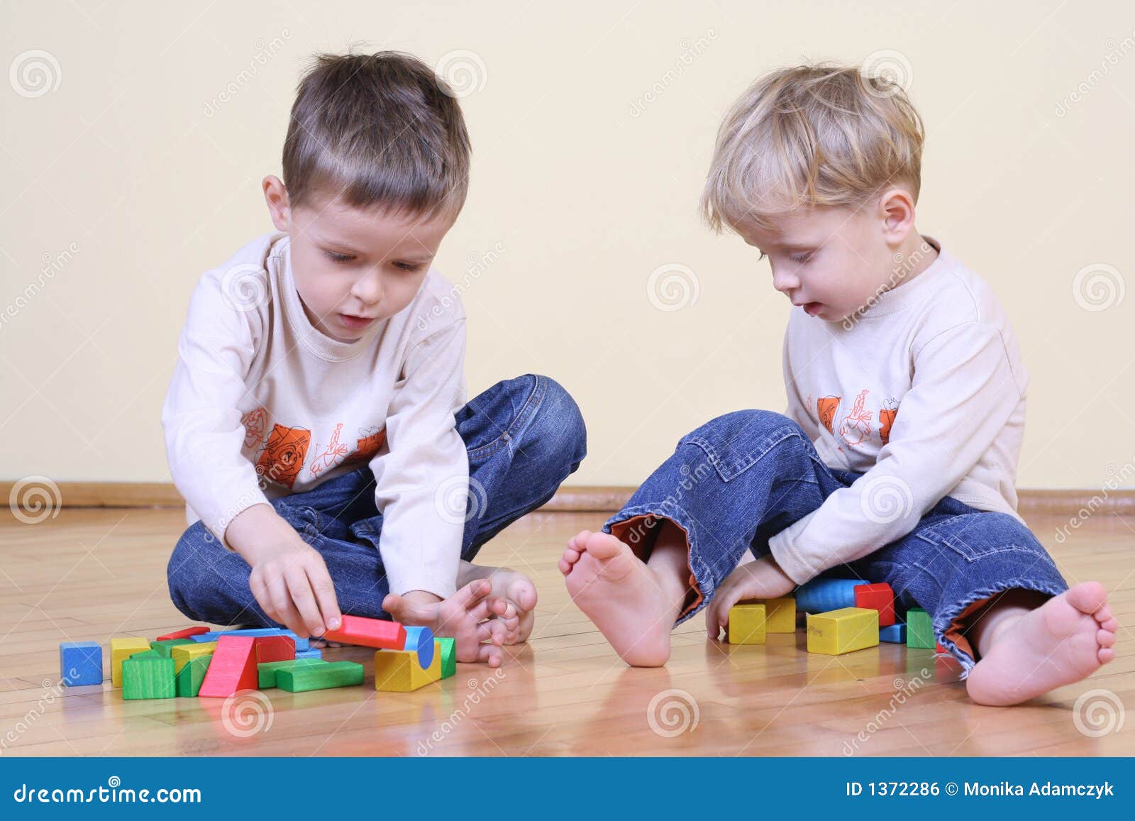 Playing with blocks stock photo. Image of children, build - 1372286