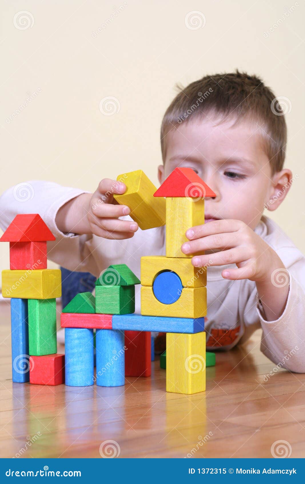 Playing with blocks stock image. Image of build, play - 1372315