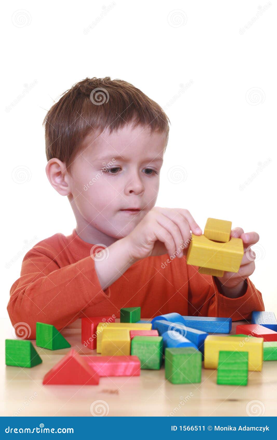 Playing with blocks stock image. Image of concentrate - 1566511