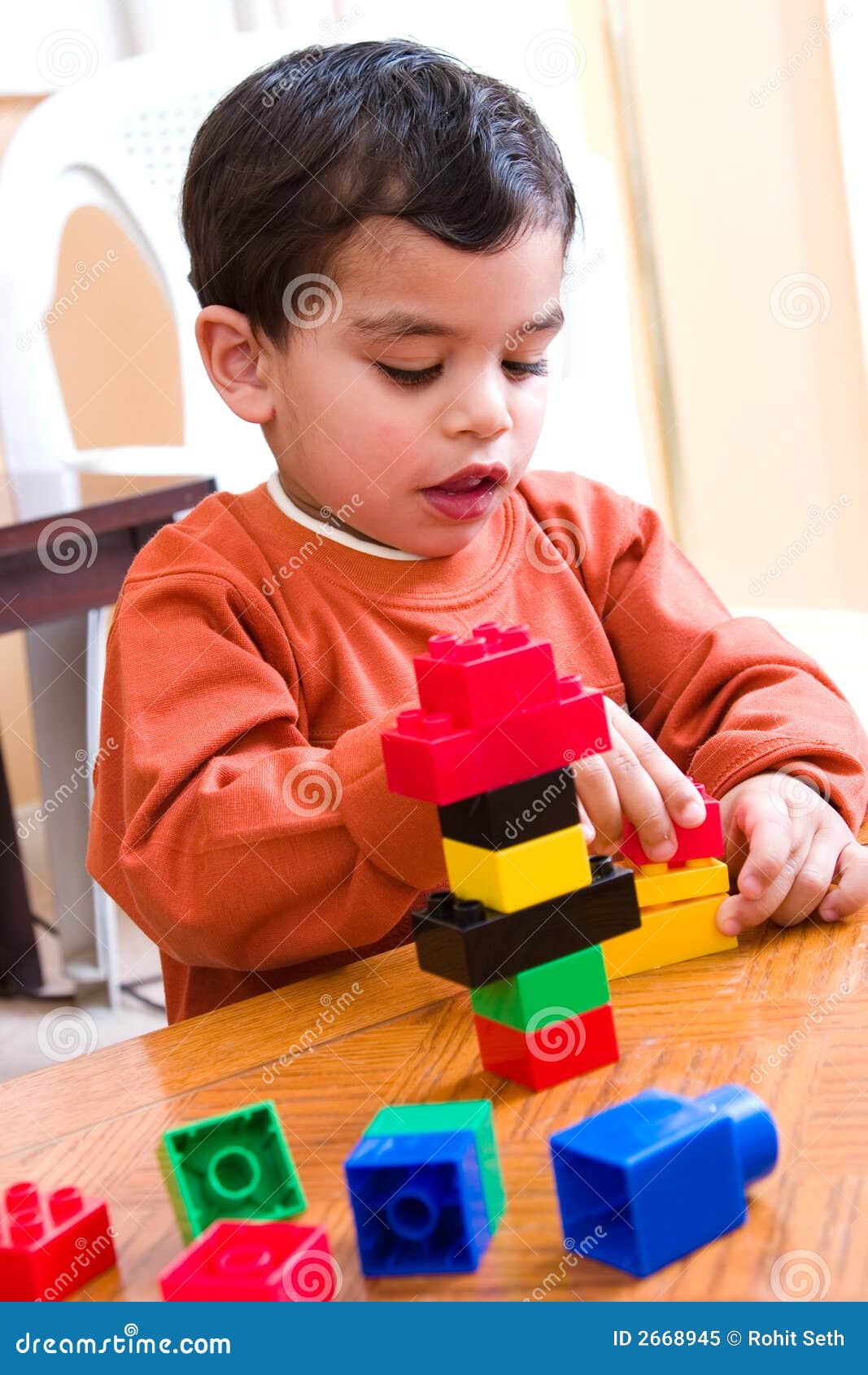 Playing with blocks stock image. Image of enjoying, young - 2668945
