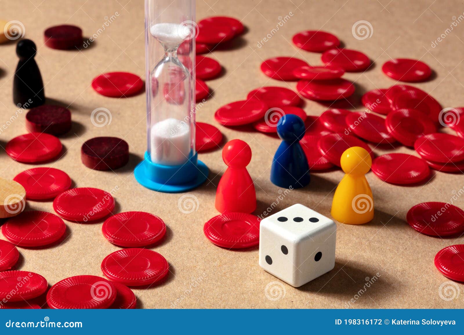 Playing Board Games at Home, Various Pieces with a Timer and a Die Cube ...