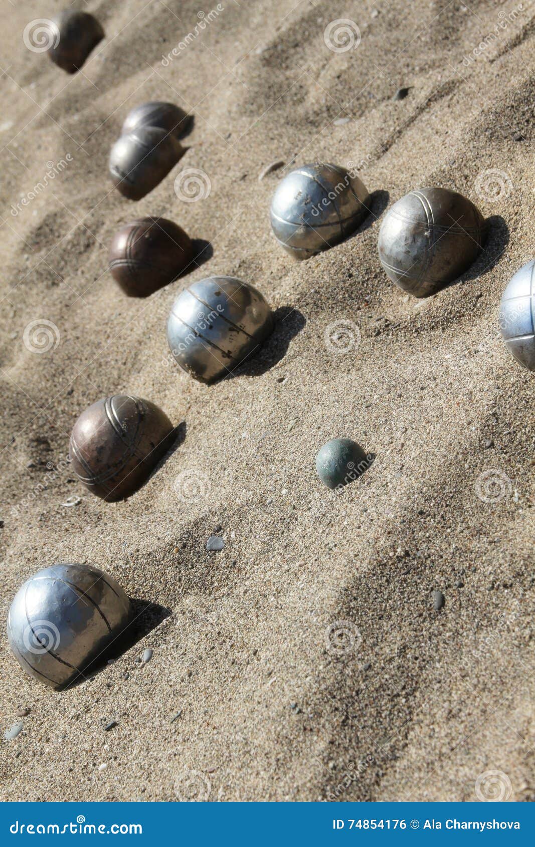 Playing of Bocce in the Sand Stock Photo - Image of boules, leisure ...