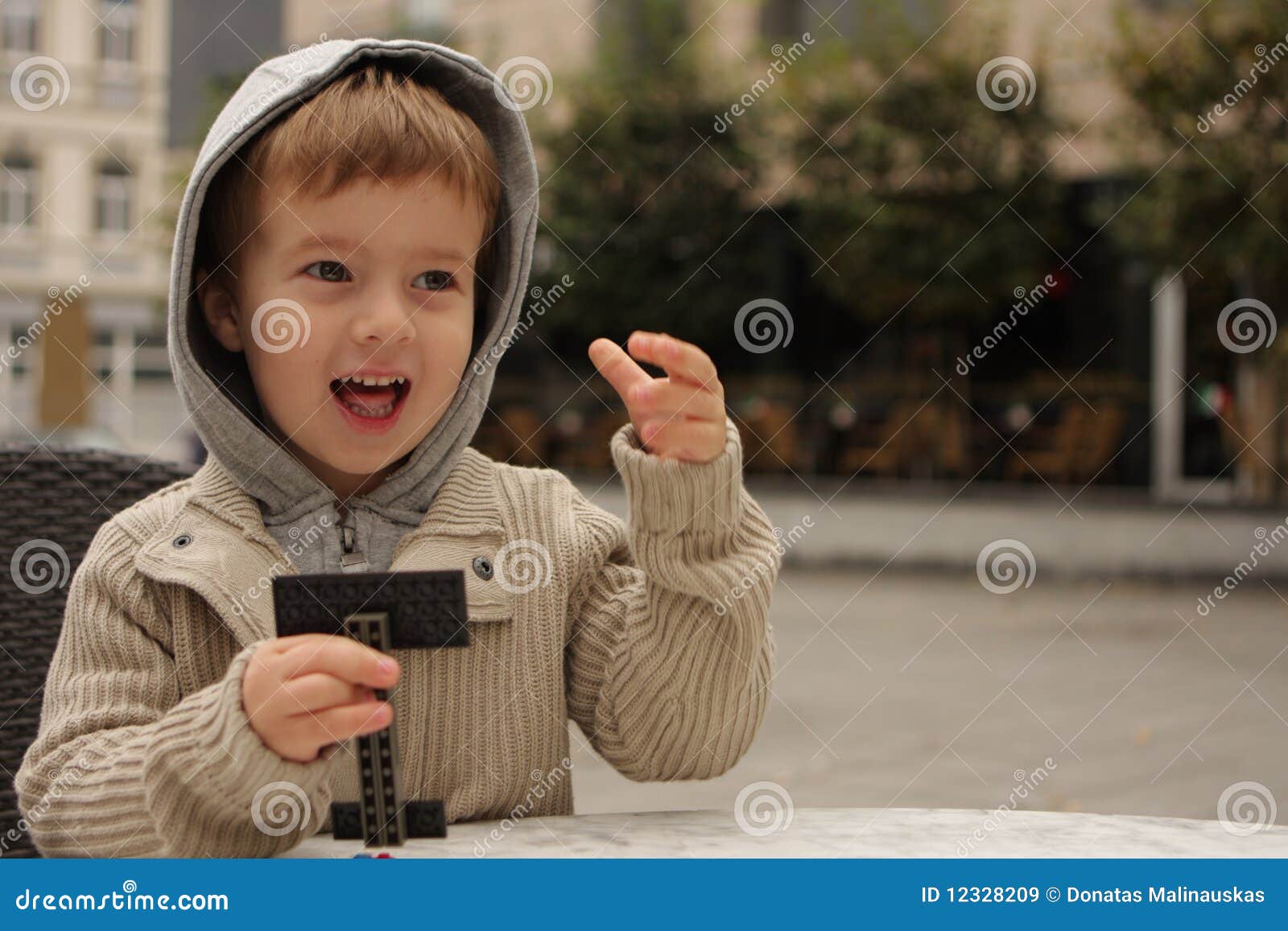 Playing boy stock image. Image of playing, concentrated - 12328209