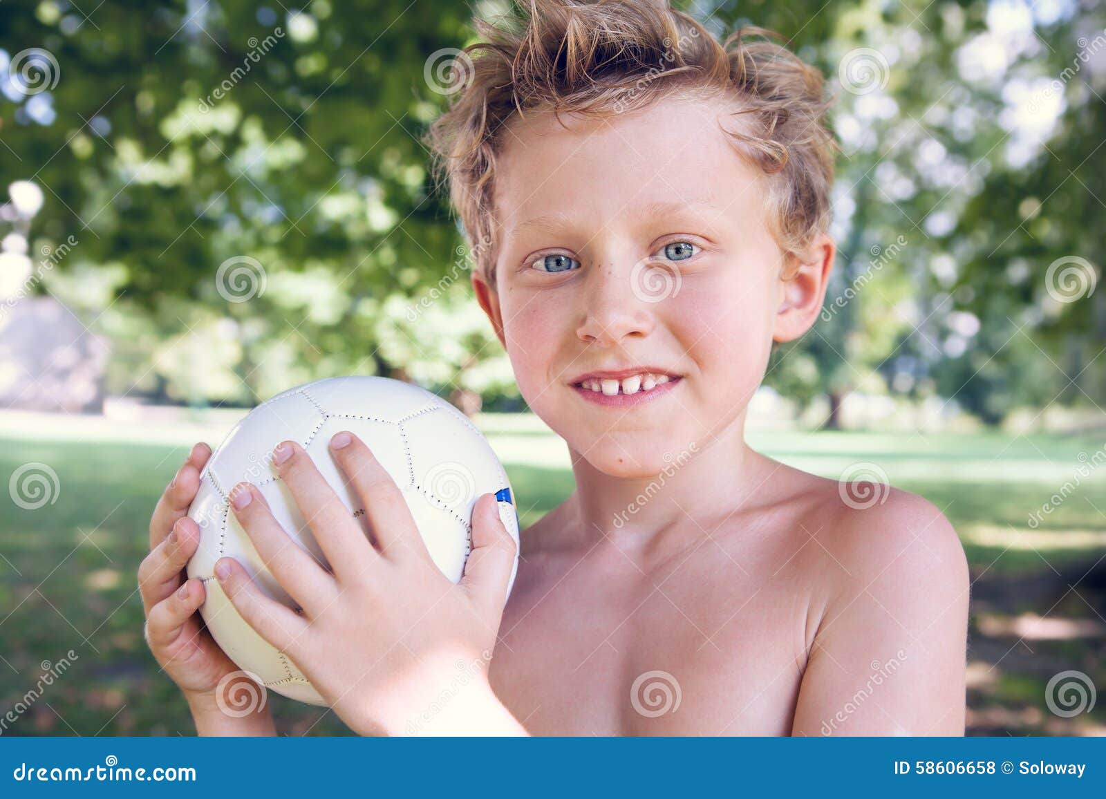 Playing boy with ball stock photo. Image of face, child - 58606658