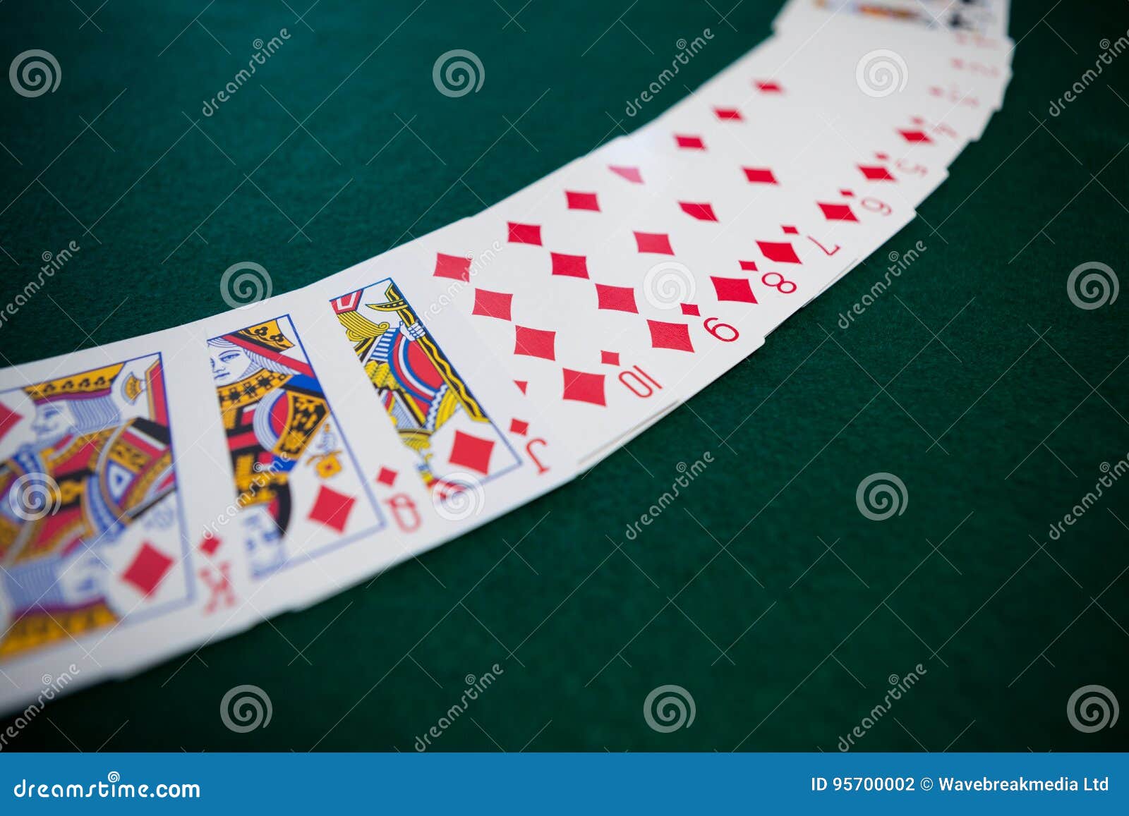 Playing Cards Arranged on Poker Table Stock Photo - Image of club ...