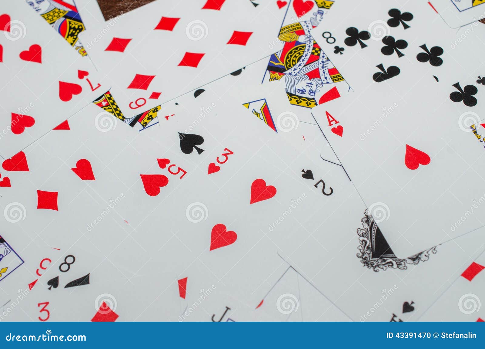 Playing cards on couch stock photo. Image of shuffeled - 43391470