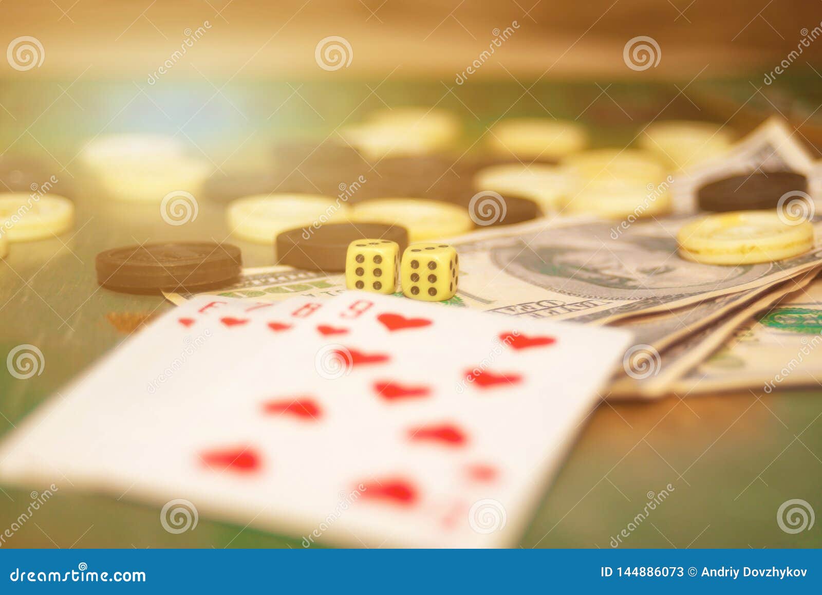 Playing Cards, Dice, Chips and Money are on the Casino Gambling Table ...