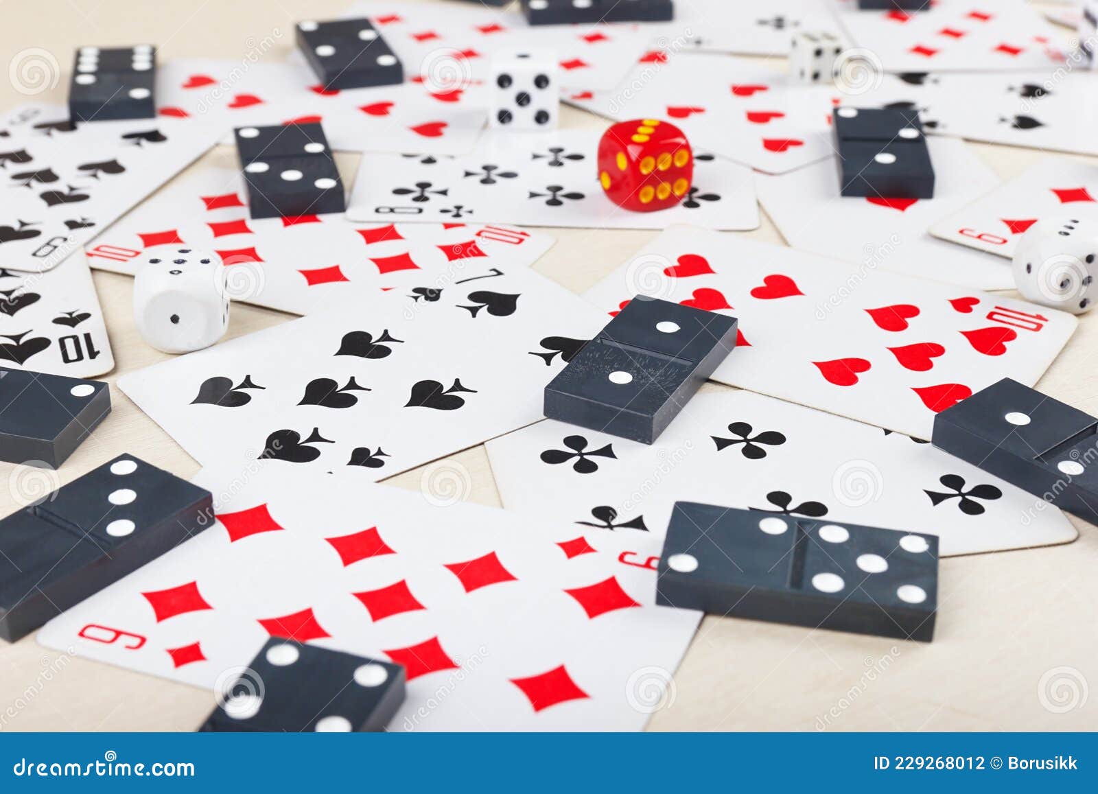 Playing Cards, Dominoes and Dice for Board Games on Table Close Up ...