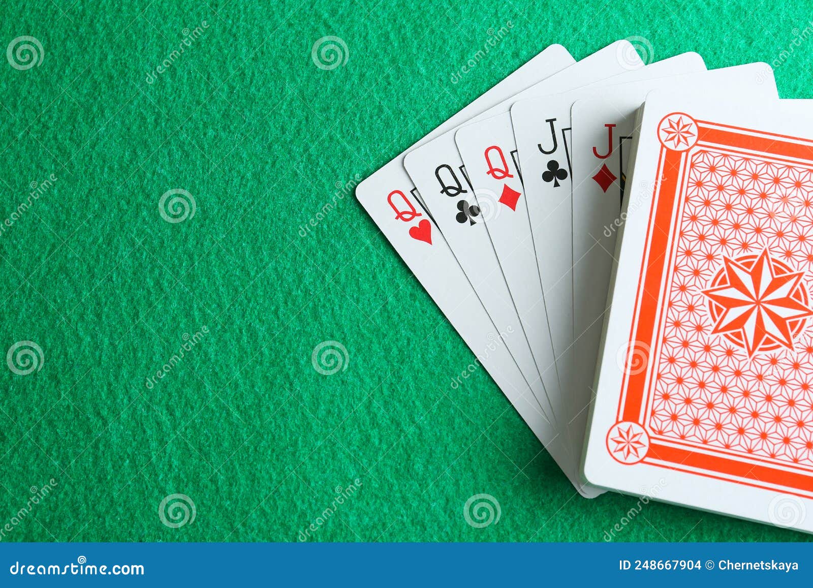 Playing Cards with Full House Combination on Green Table, Top View ...