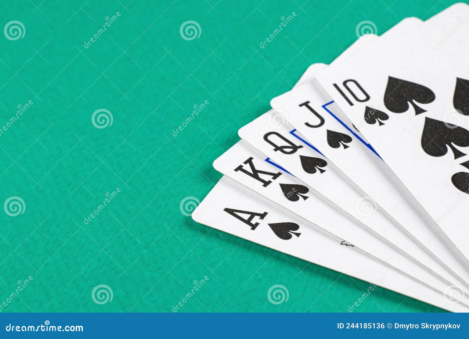 Playing Cards on Green Background Stock Photo - Image of closeup ...