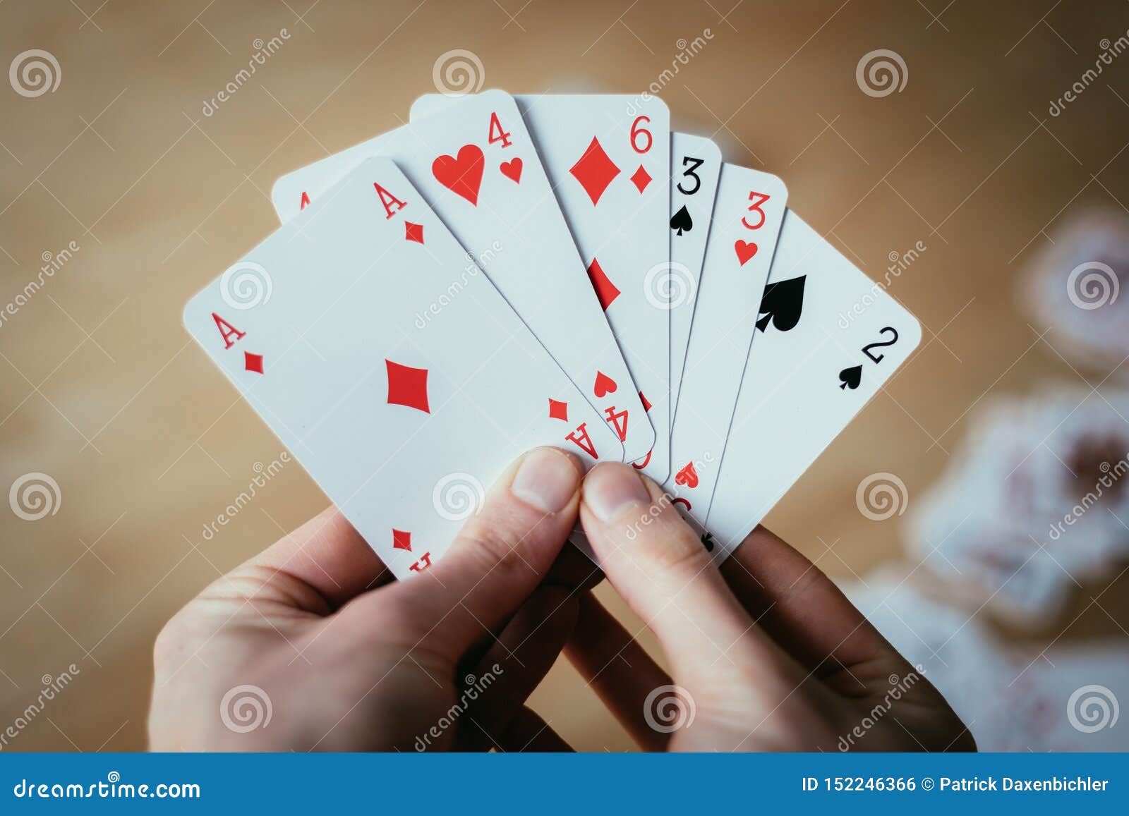 Playing Cards: Poker Cards in the Hand of a Young Man Stock Photo ...