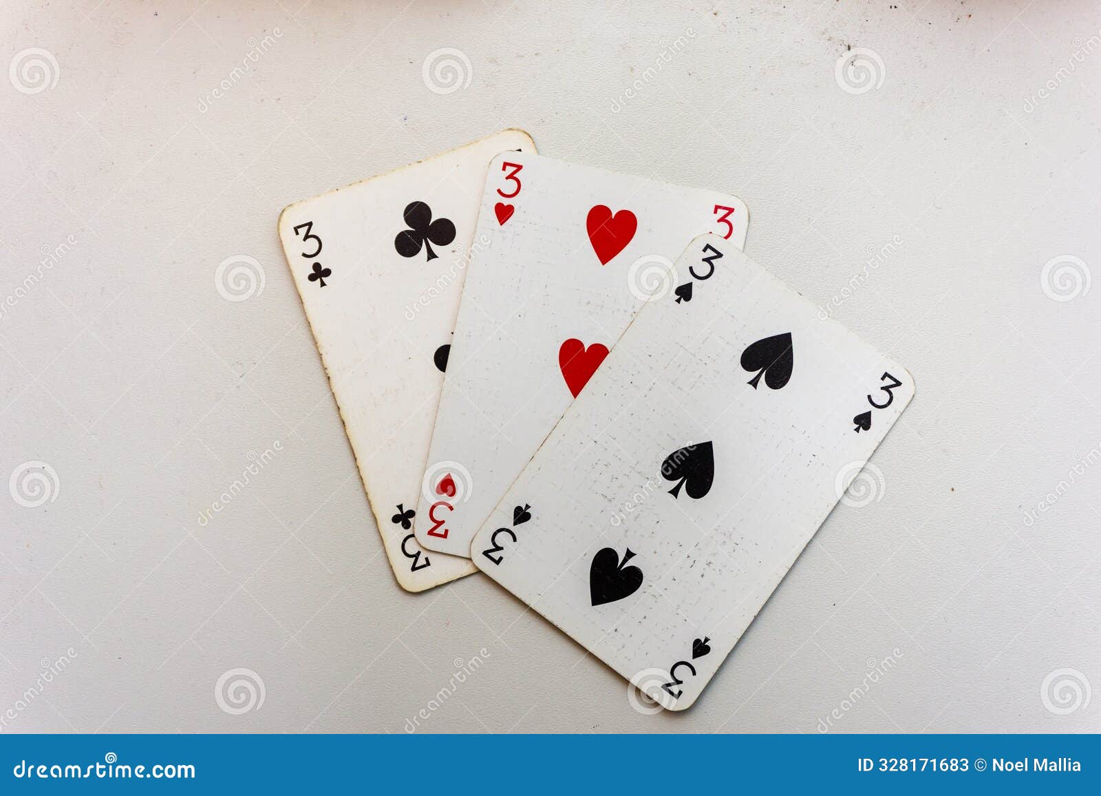 Playing cards on a table stock image. Image of poker - 328171683