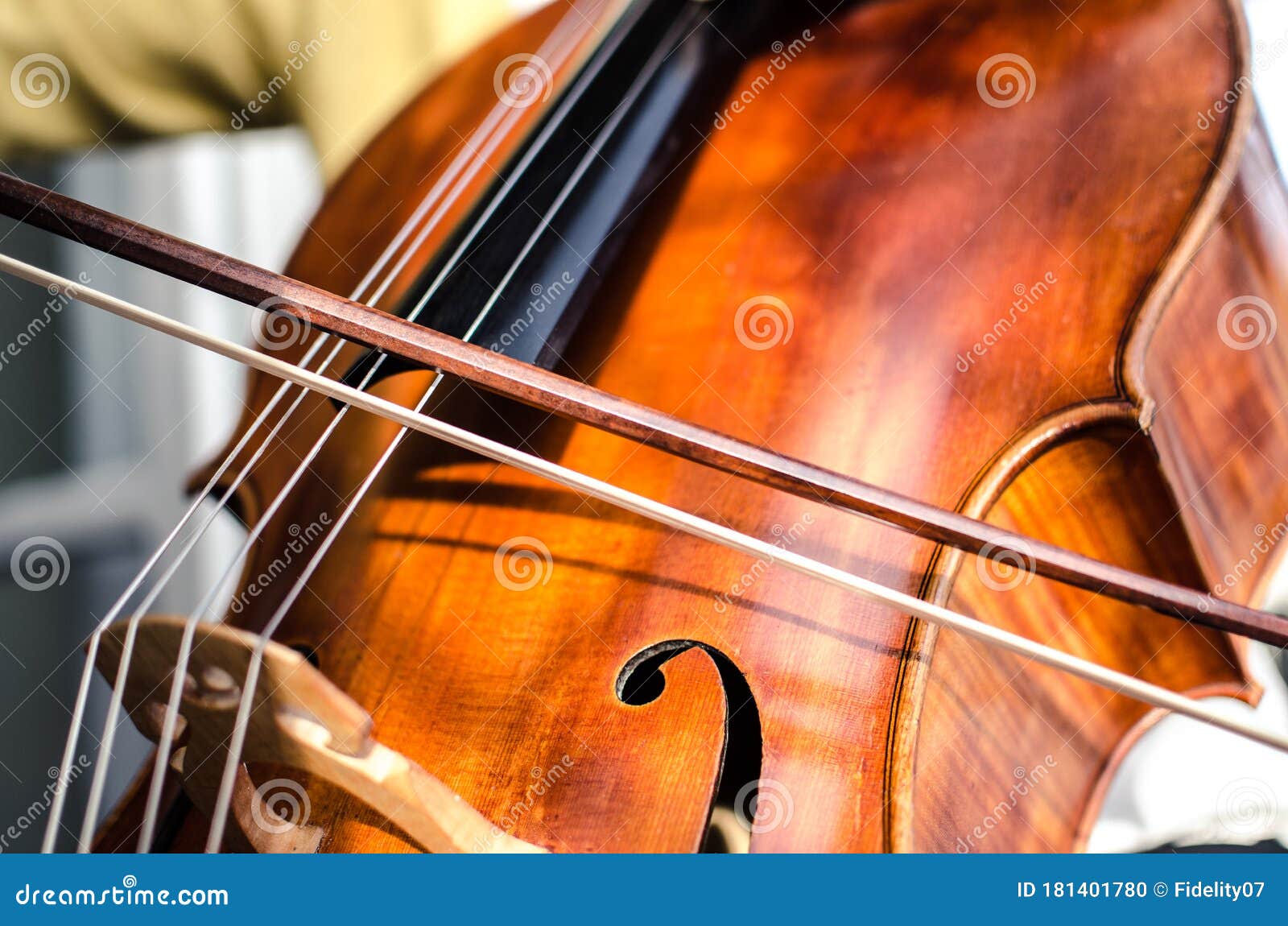 Playing cello close-up stock photo. Image of cello, cellist - 181401780