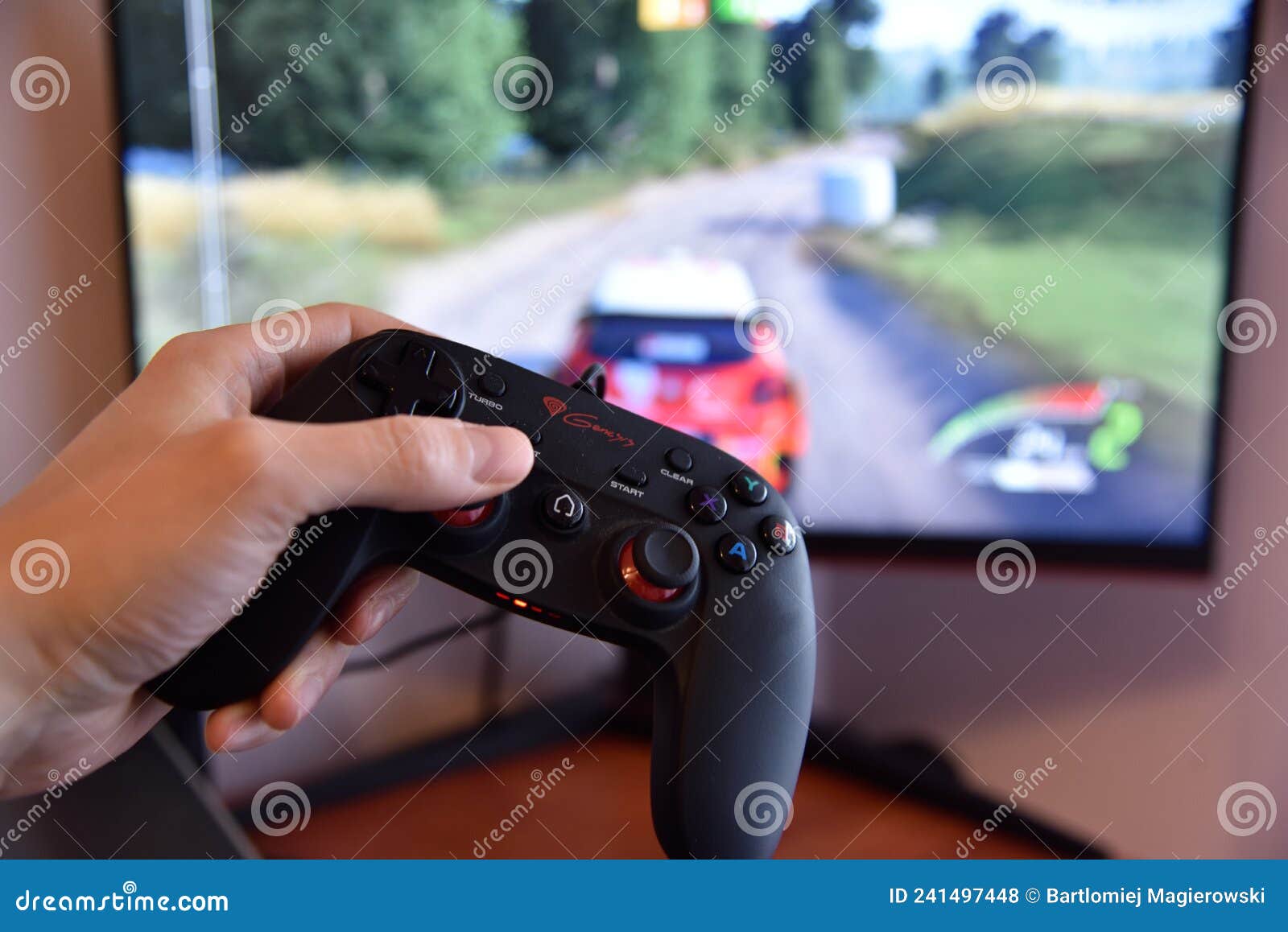 Gamepad and Racing Game on Computer Screen Editorial Stock Photo ...