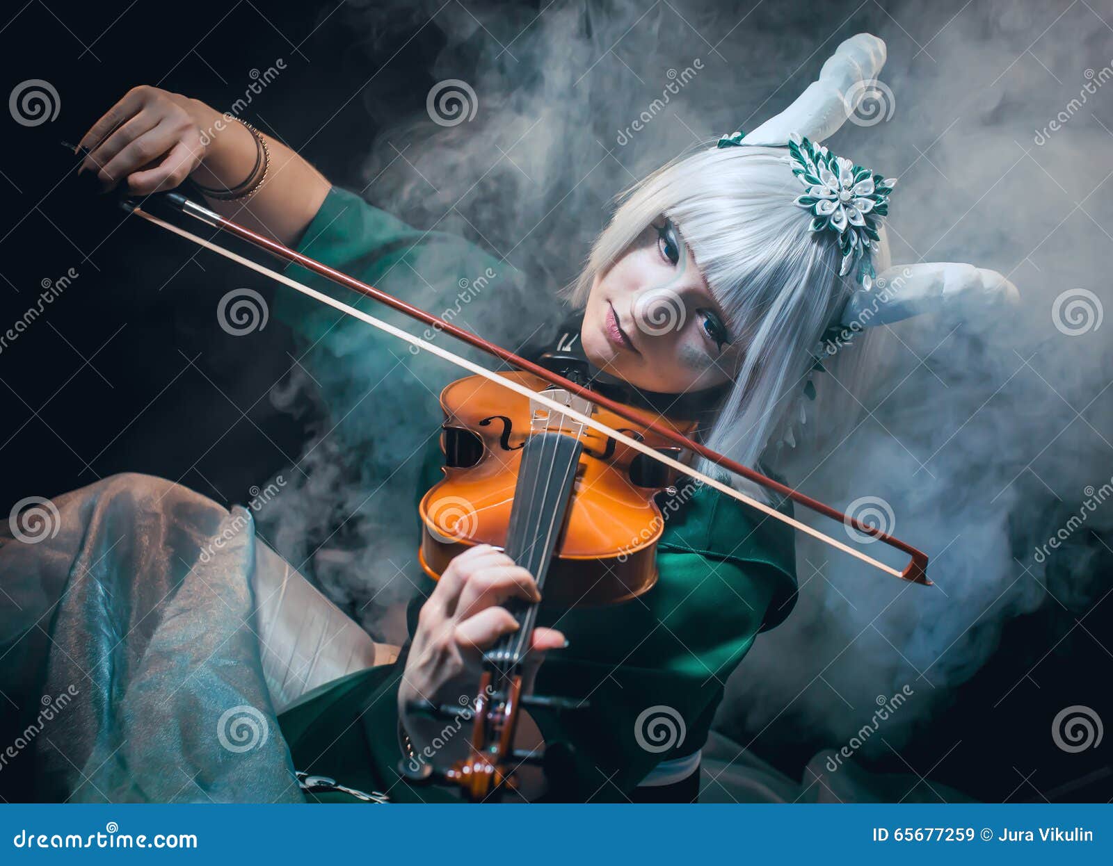Playing the devil`s music stock image. Image of glamour - 65677259
