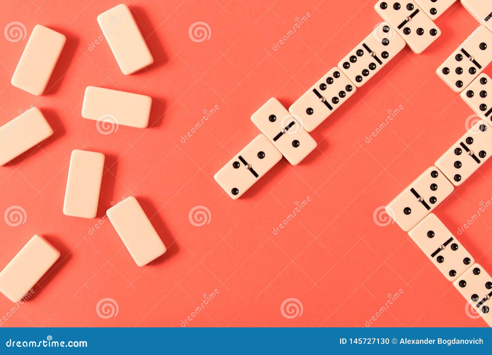 Playing Dominoes on a Red Background. Domino Effect Stock Photo - Image ...