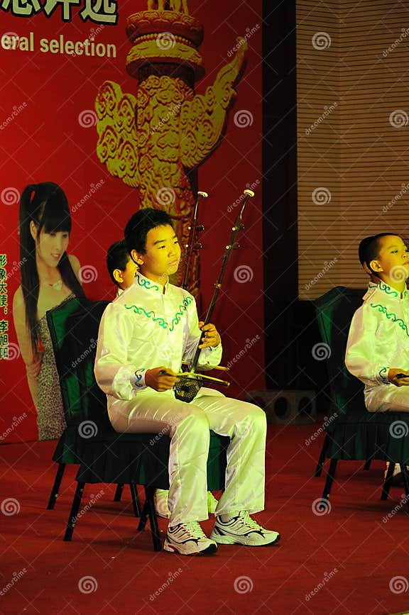Playing the erhu boys editorial stock photo. Image of music - 25611858