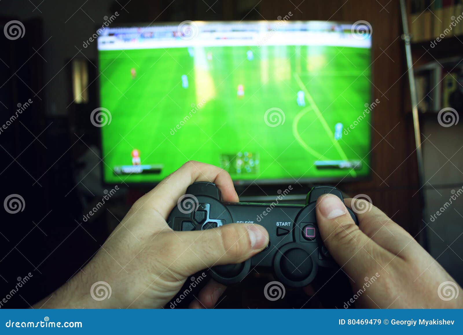Playing Football with the Joystick on the Game Console Stock Image ...