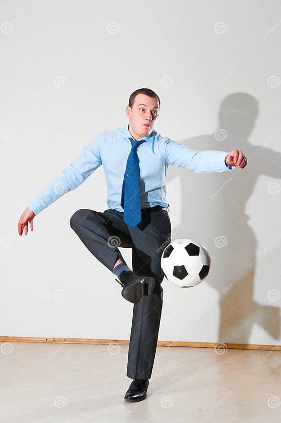 Playing football at office stock photo. Image of background - 21373248