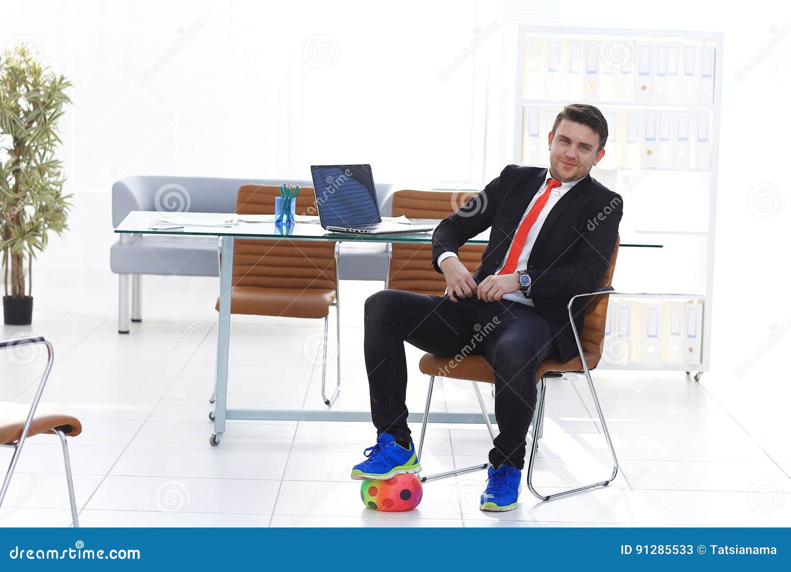 Playing football in office stock image. Image of active - 91285533