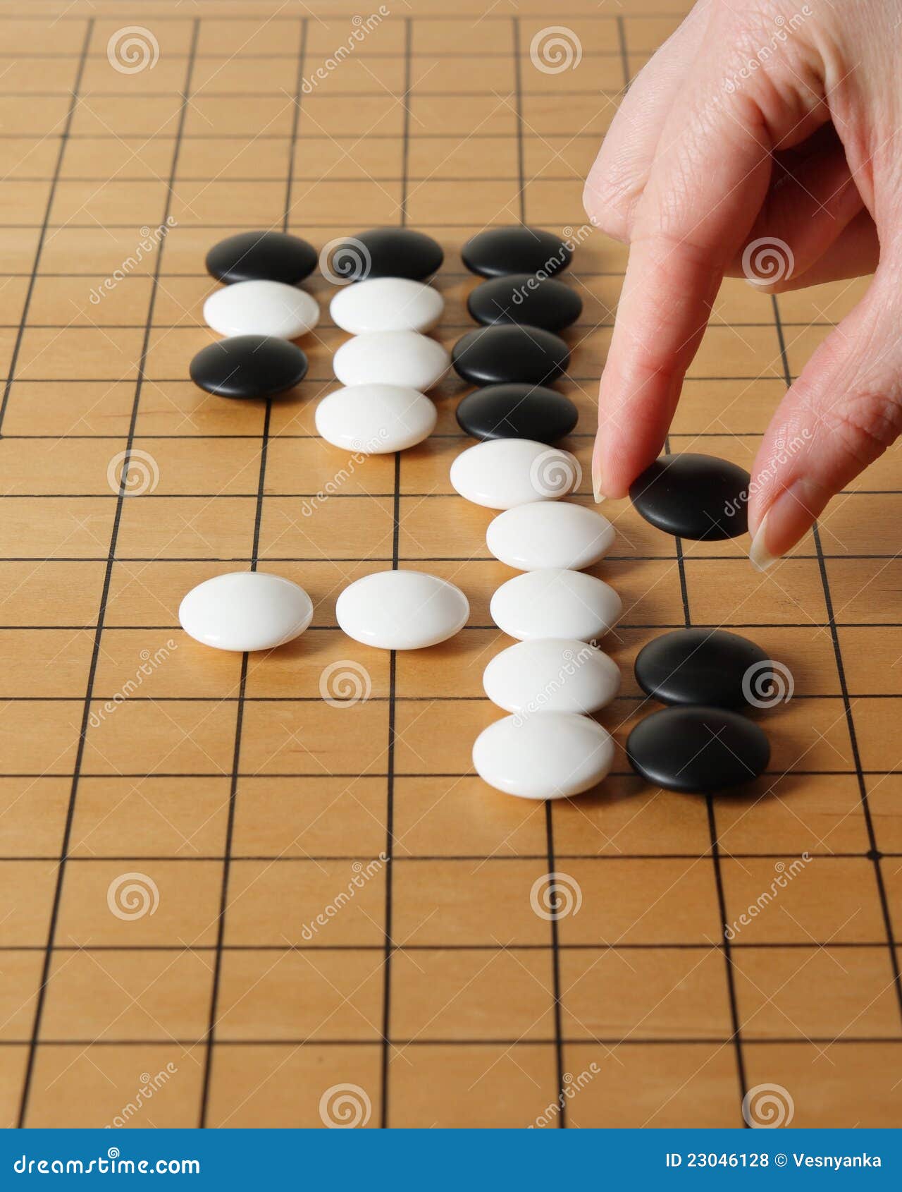 Playing the game of Go stock photo. Image of game, competition - 23046128