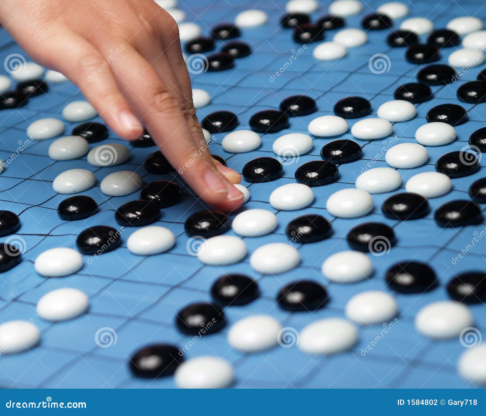 Playing a go game #2 stock photo. Image of logic, strategy - 1584802