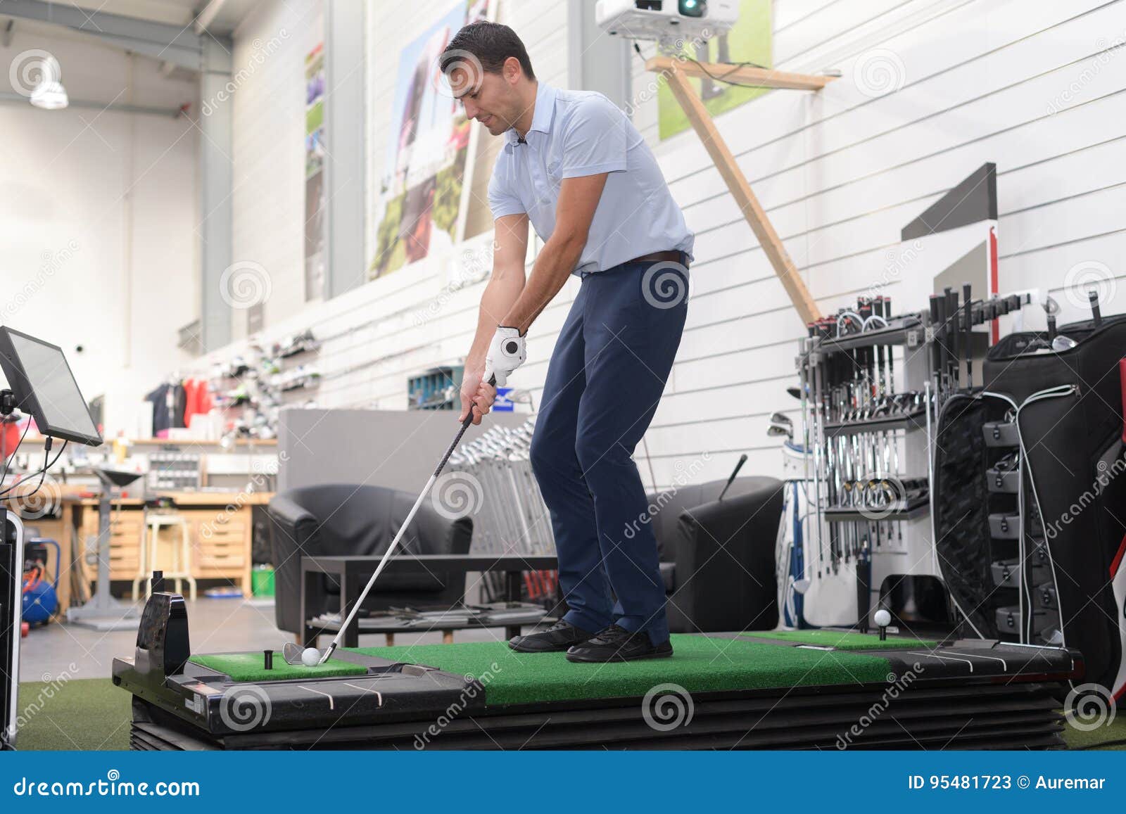 Playing golf at office stock image. Image of feet, ball - 95481723