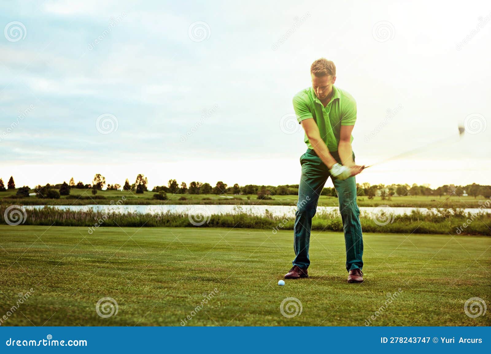 Playing Golf and Playing it Well. a Man Practicing His Swing on the ...