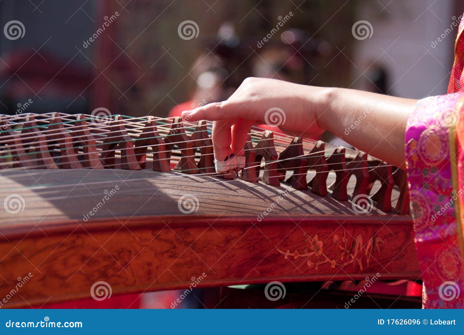 Playing Guzheng Royalty Free Stock Image - Image: 17626096