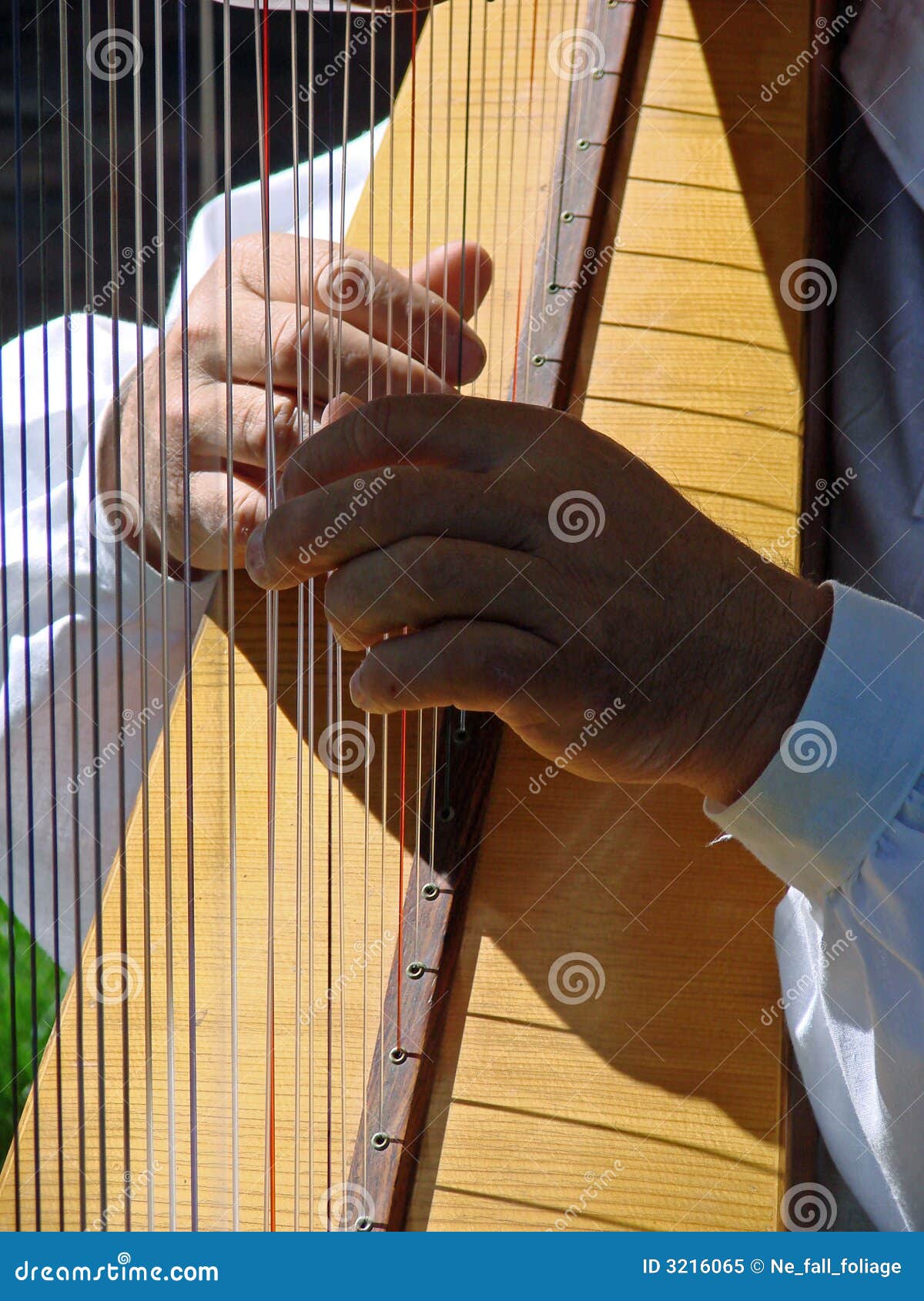 Playing a Harp stock image. Image of performance, hands - 3216065