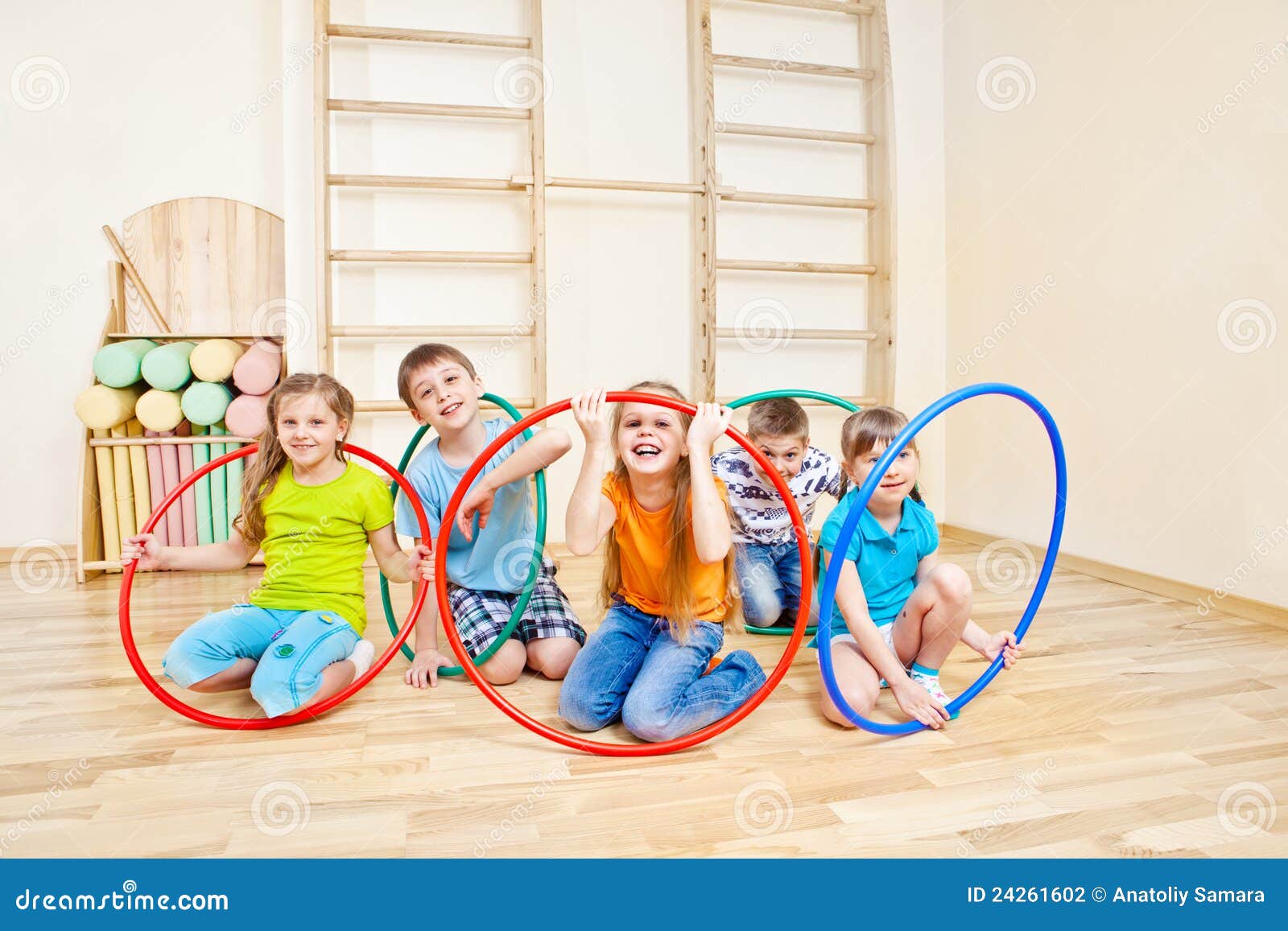 Playing with hula hoops stock photo. Image of cute, children - 24261602
