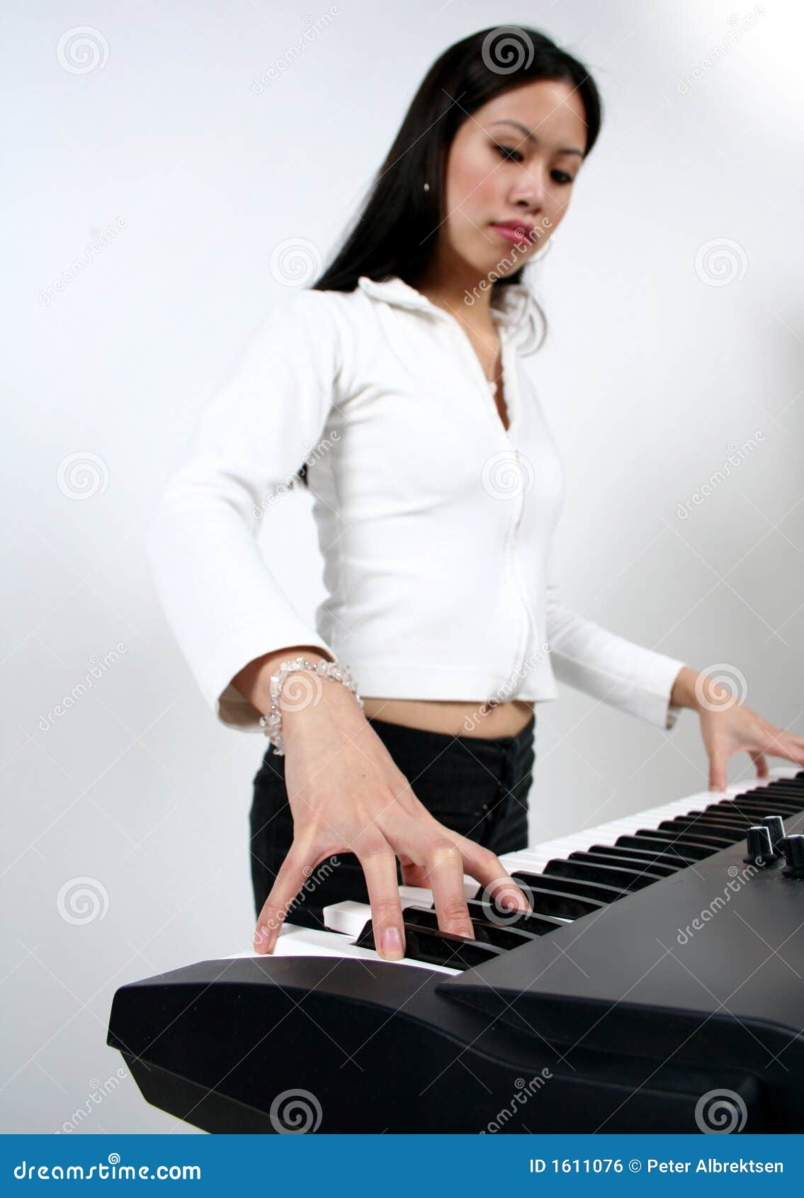 Playing keyboards stock photo. Image of beauty, beautiful - 1611076
