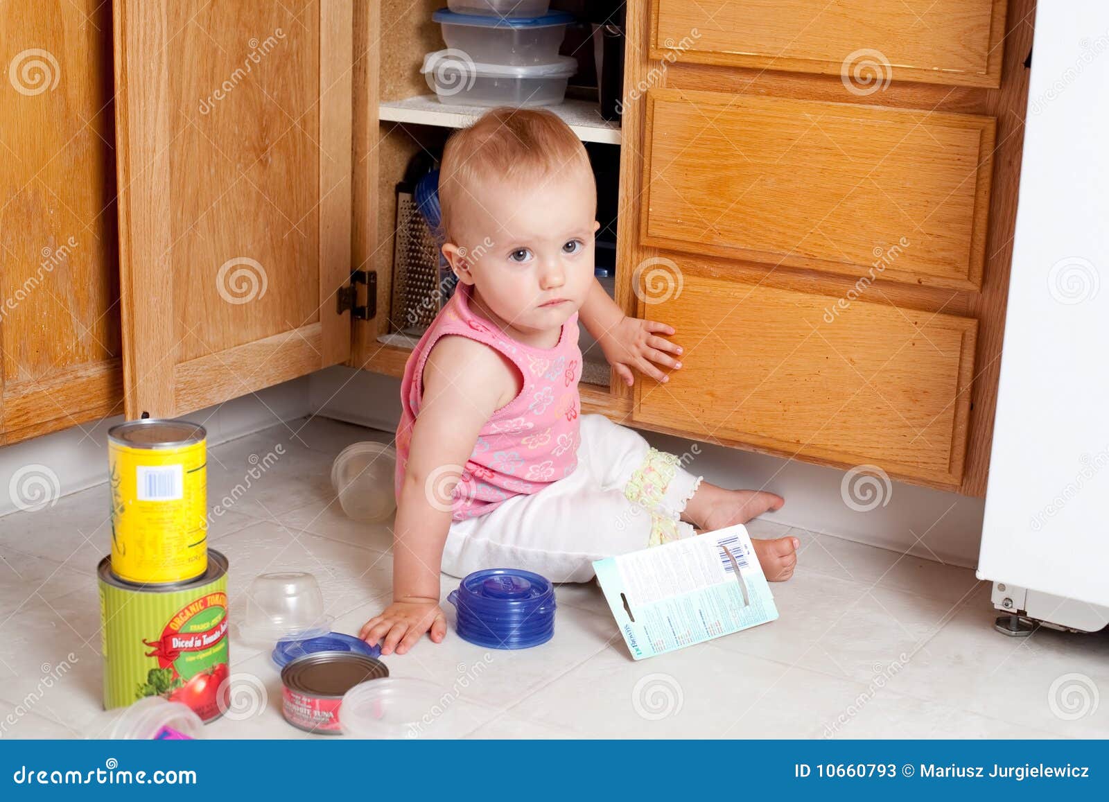 Playing in the kitchen stock image. Image of baby, happy - 10660793