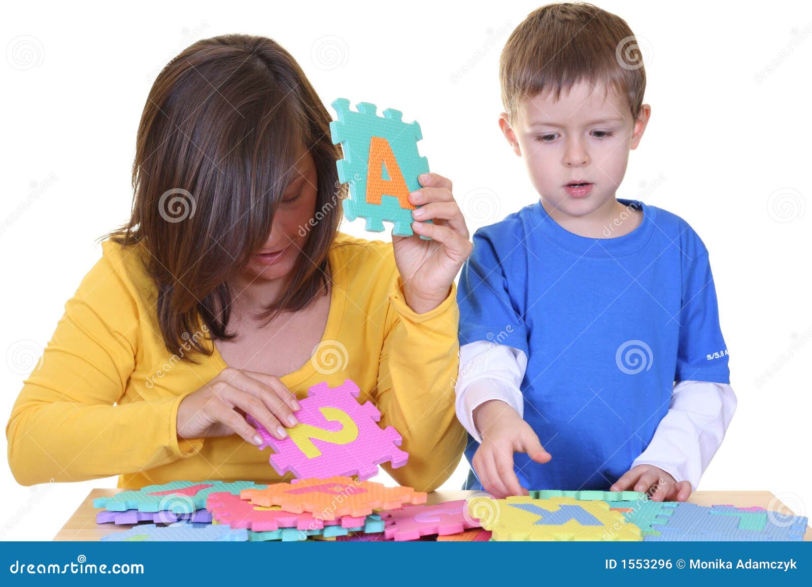 Playing with letters stock photo. Image of elementary - 1553296