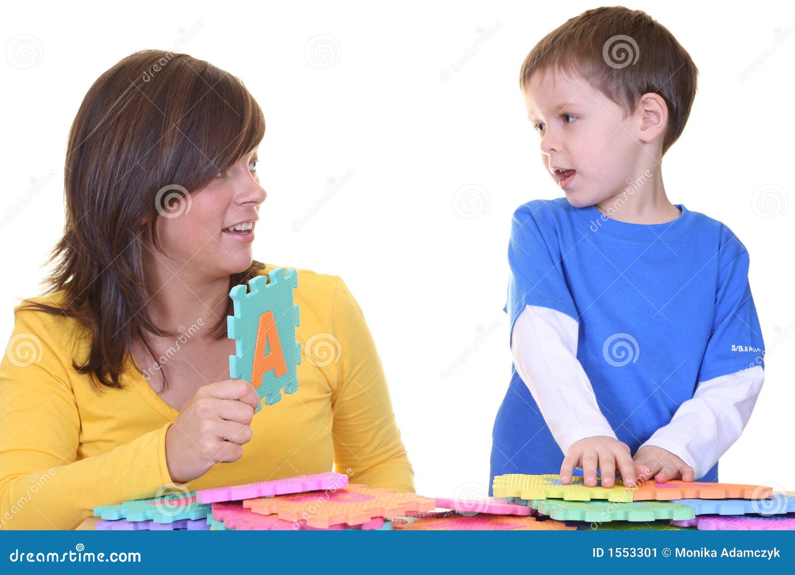 Playing with letters stock image. Image of alphabet, mother - 1553301