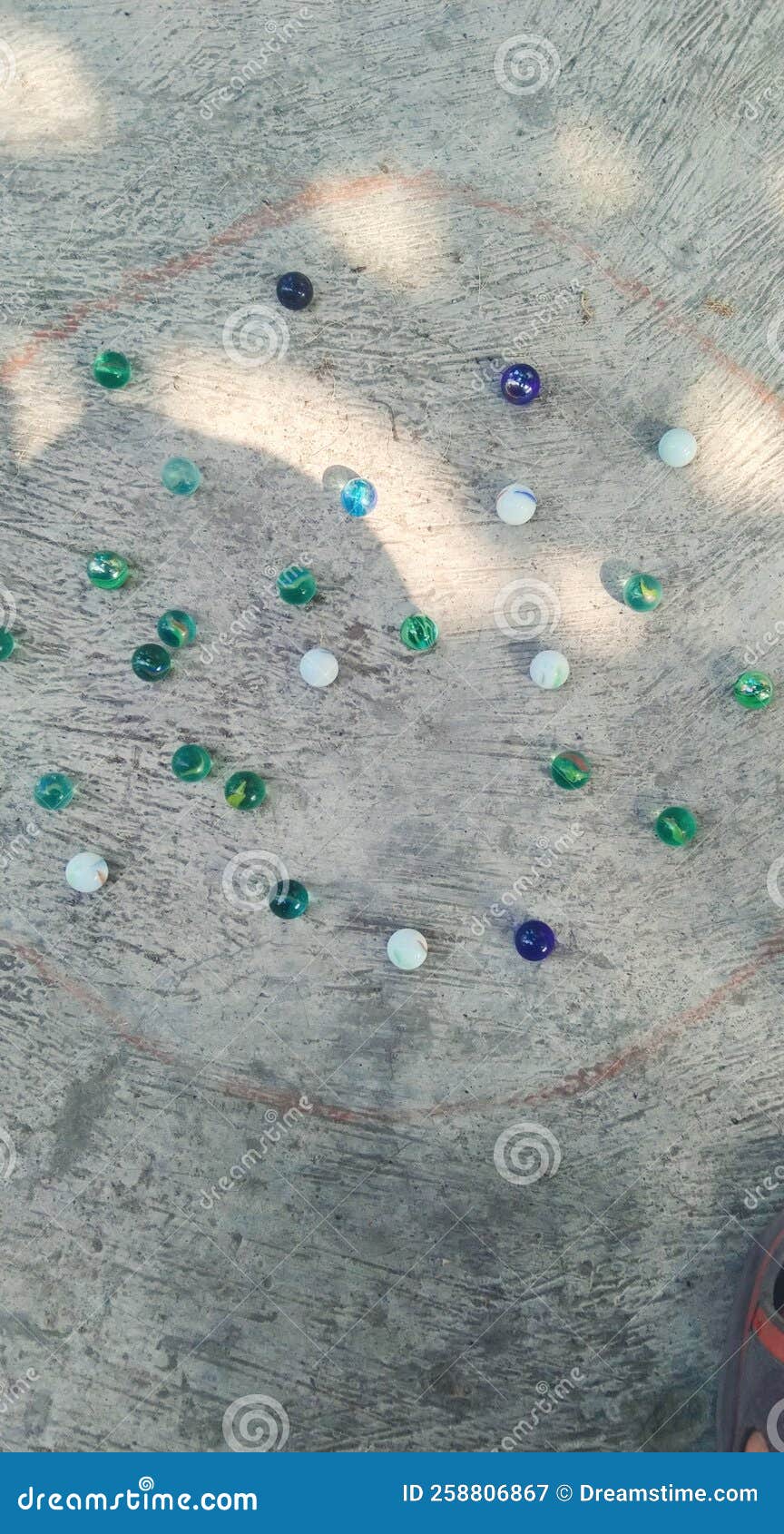 Playing Marbles stock image. Image of marbles, playing - 258806867