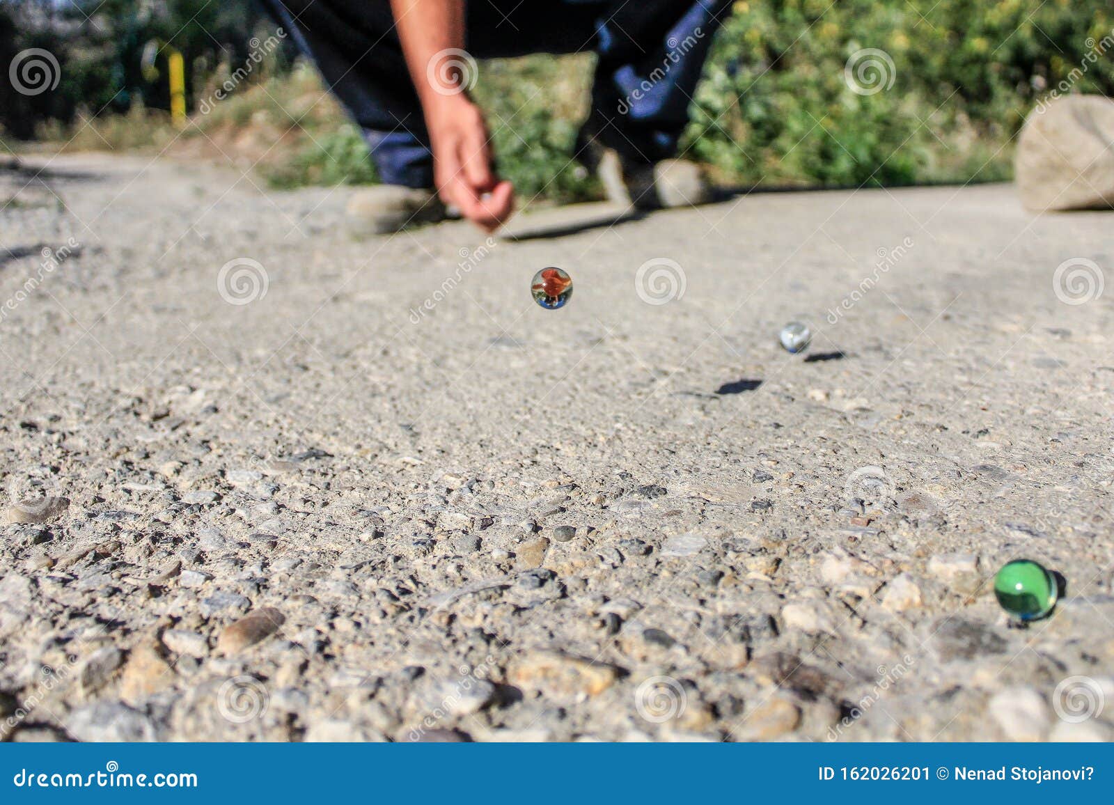 Playing with marbles stock image. Image of whitebarble - 162026201