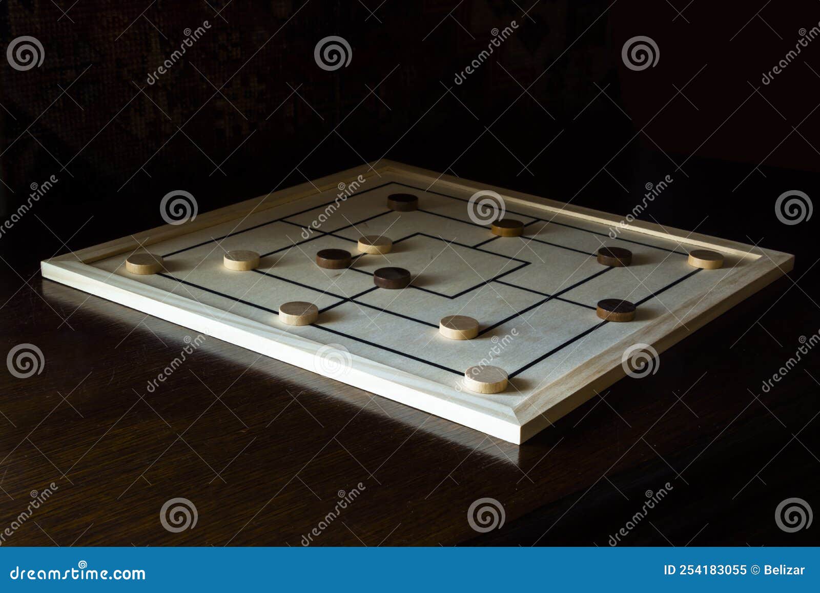 Playing Mill Game on a Wooden Table Stock Image - Image of board ...
