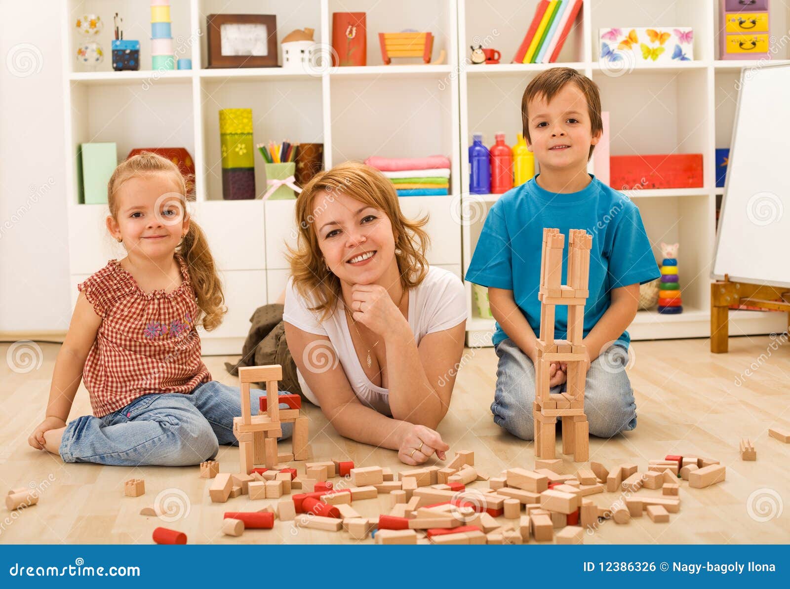 Playing with mom is fun stock photo. Image of leisure - 12386326