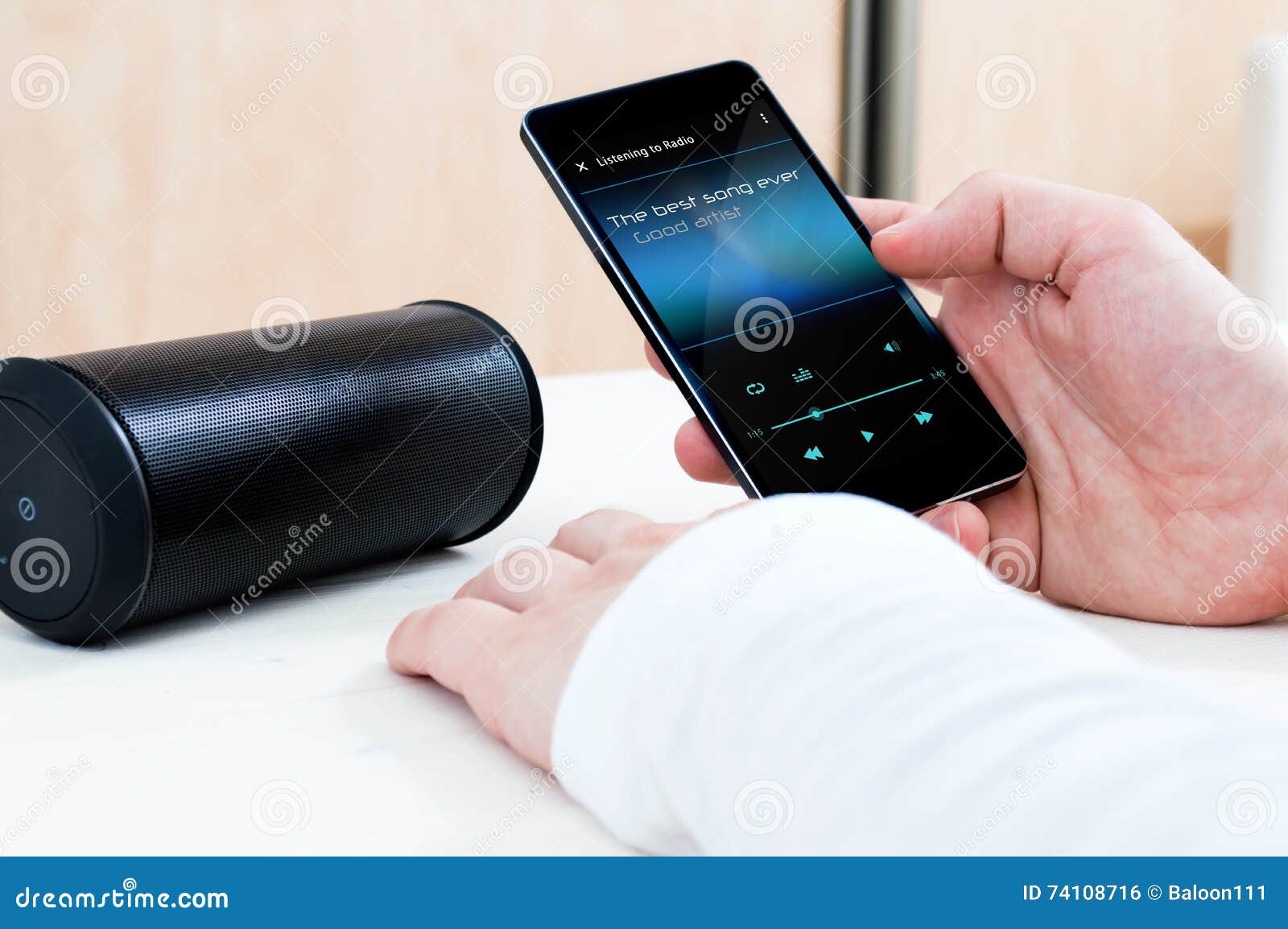 Playing Music on a Wireless Speaker Stock Photo - Image of home, music ...